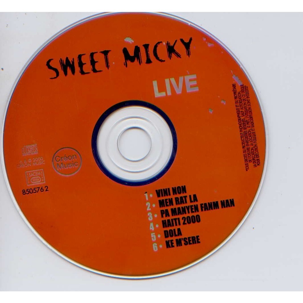 Sweet micky live de Michel Martelly, CD chez grigo - Ref:115496871