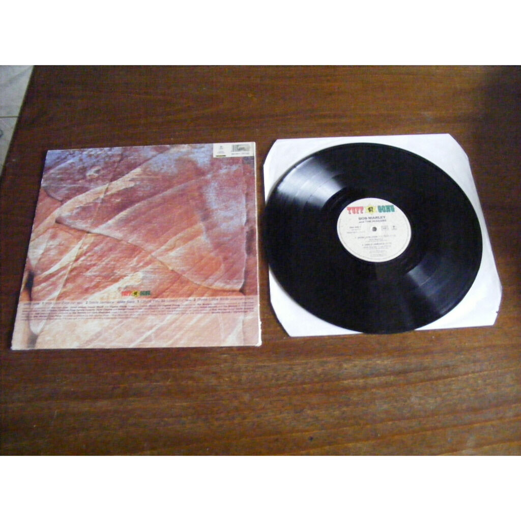 Iron lion zion / smile jamaica / could you be loved / three little ...